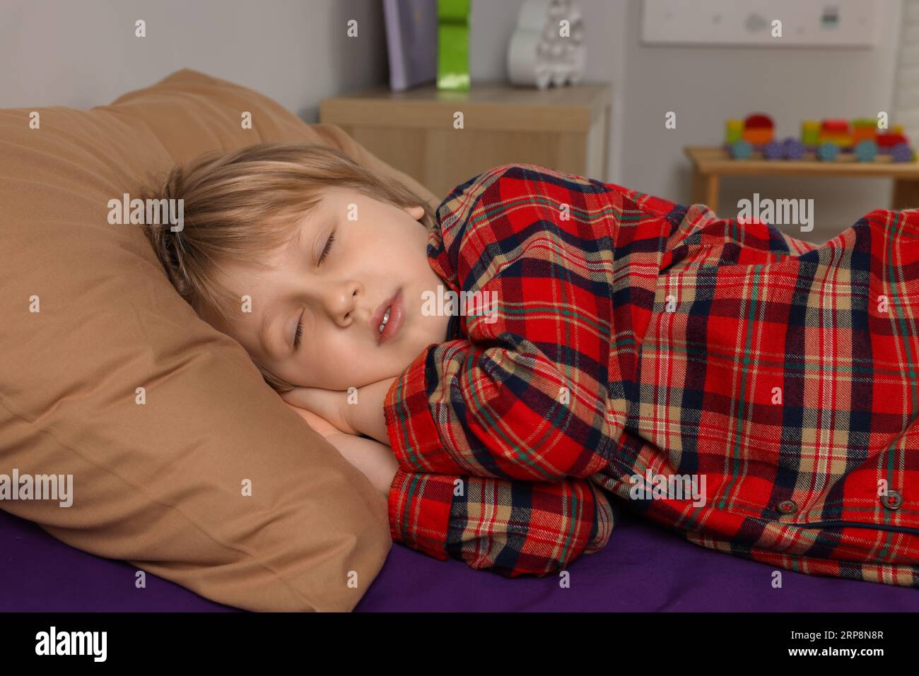 Little boy snoring while sleeping in bed at home Stock Photo - Alamy