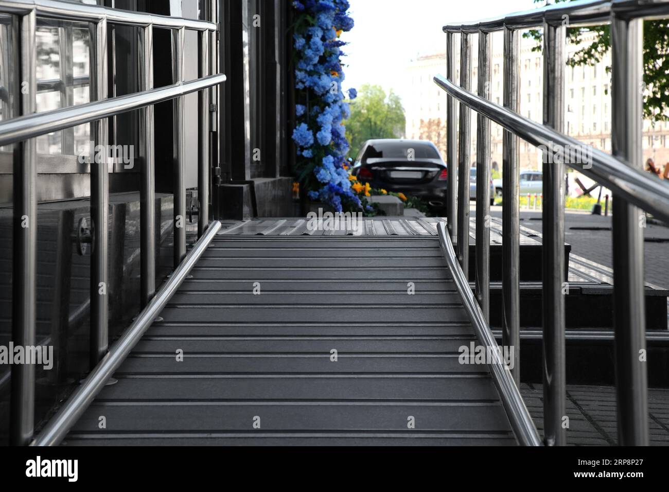 Ramp with metal railings near building outdoors Stock Photo - Alamy