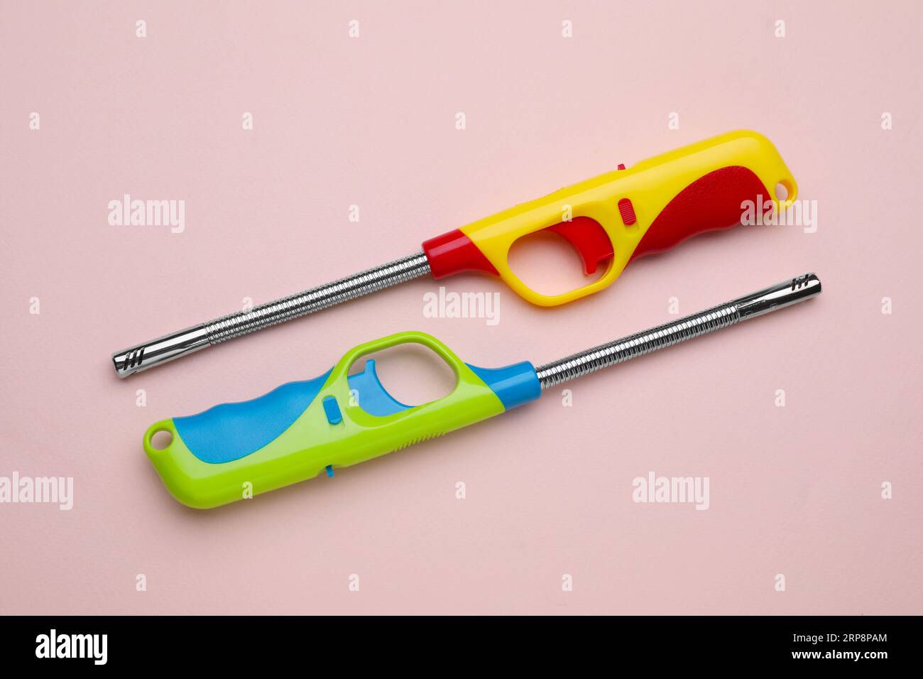 Gas lighters on beige background, flat lay Stock Photo - Alamy