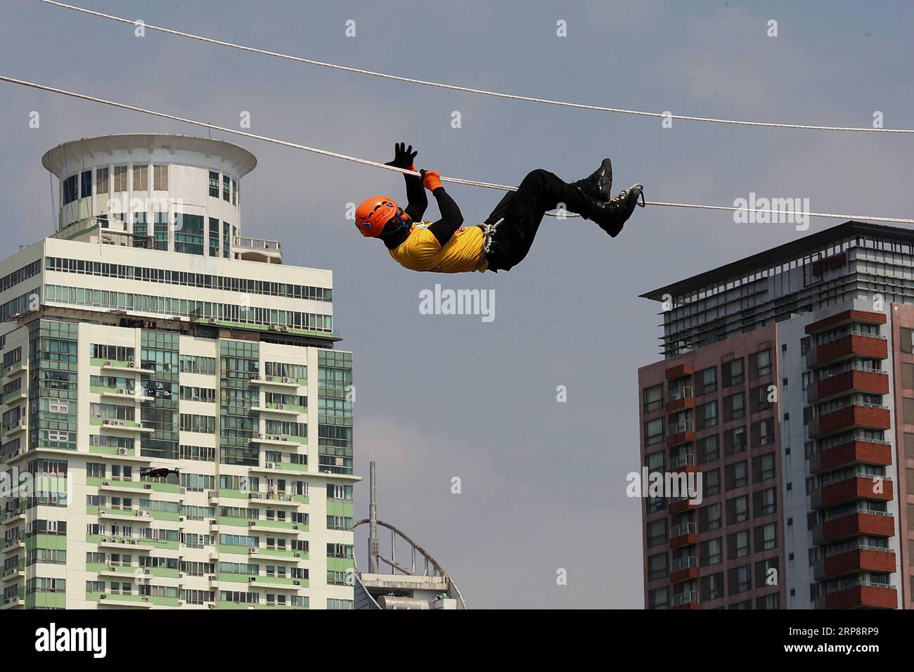(190314) -- MANILA, March 14, 2019 -- A fire volunteer participates in ...