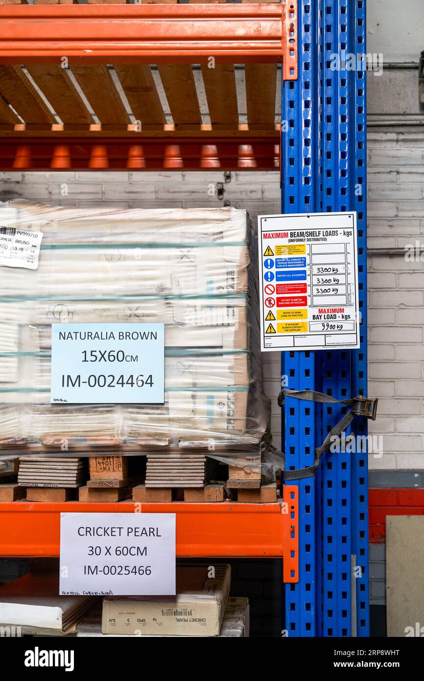 Safety recommendations sign attached to metal racking Stock Photo - Alamy