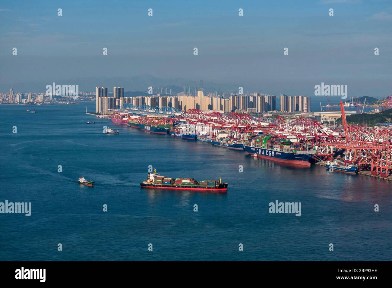QINGDAO, CHINA - SEPTEMBER 3, 2023 - Container ships dock and depart ...