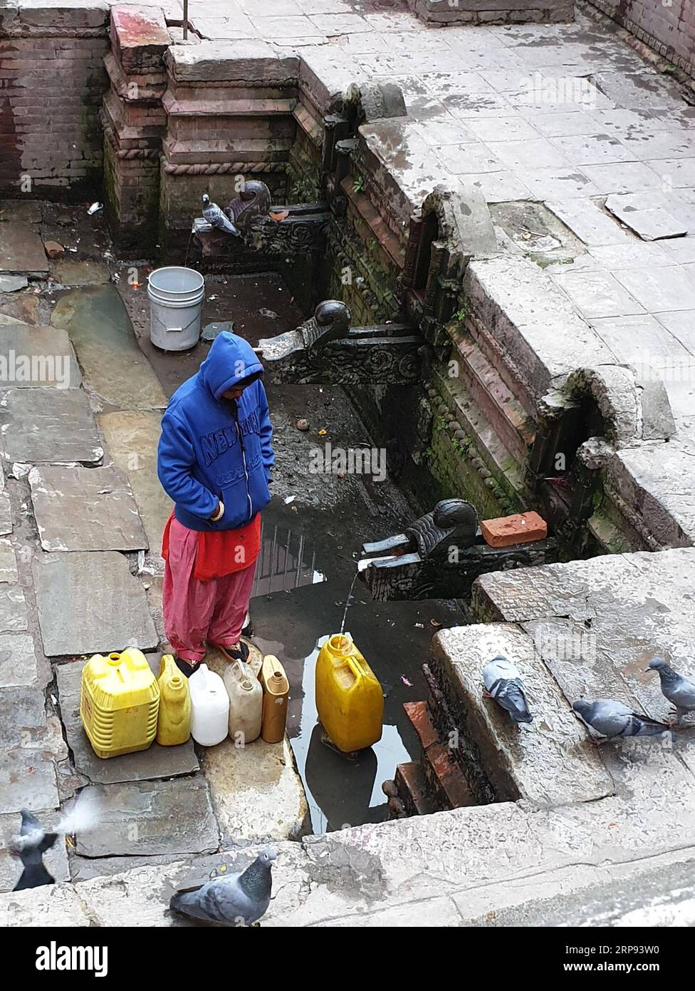 (190322) -- KATHMANDU, March 22, 2019 -- A Nepalese waits with empty ...