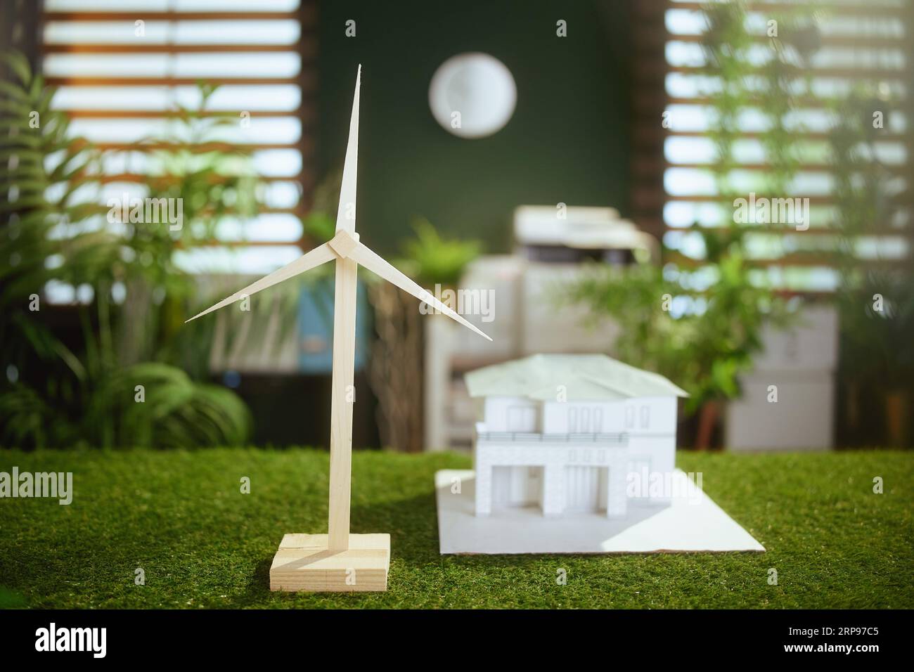 Sustainable business. grass desk in modern green office with paper ...