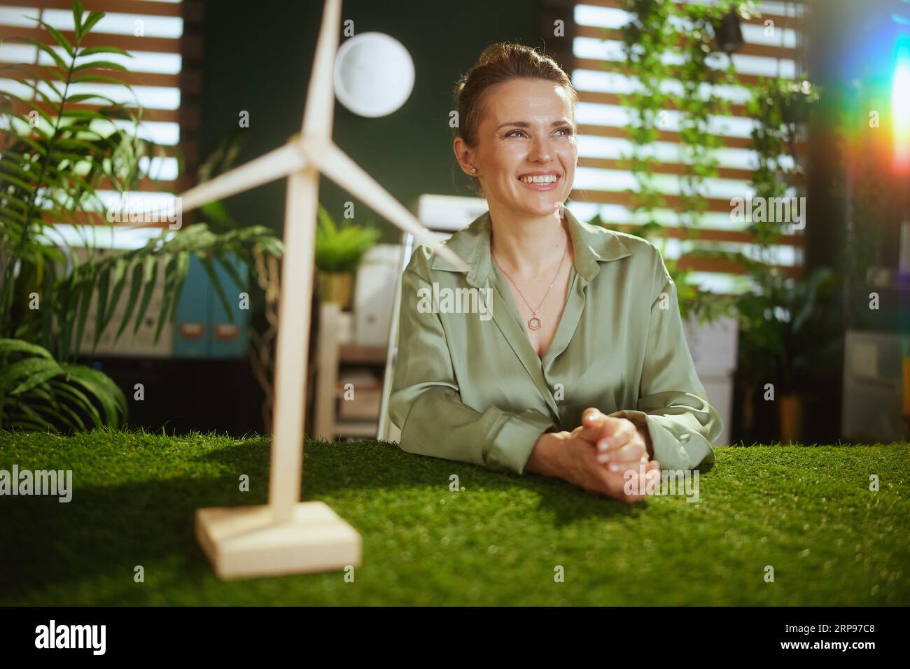 Eco trends. smiling stylish middle aged small business owner woman in ...