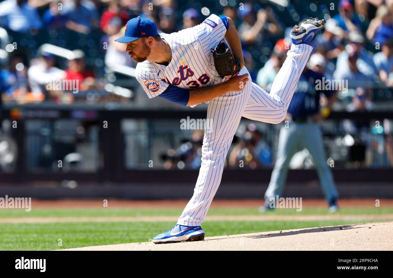 New York Mets starting pitcher Tylor Megill (38) throws against the ...
