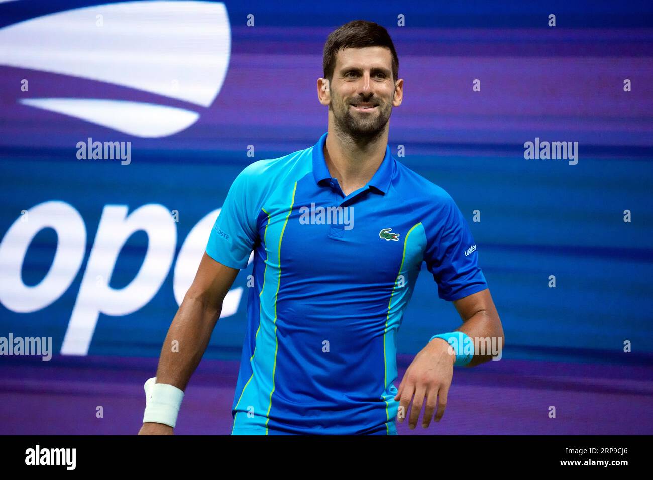 Novak Djokovic, of Serbia, smiles as he plays Borna Gojo, of Croatia ...