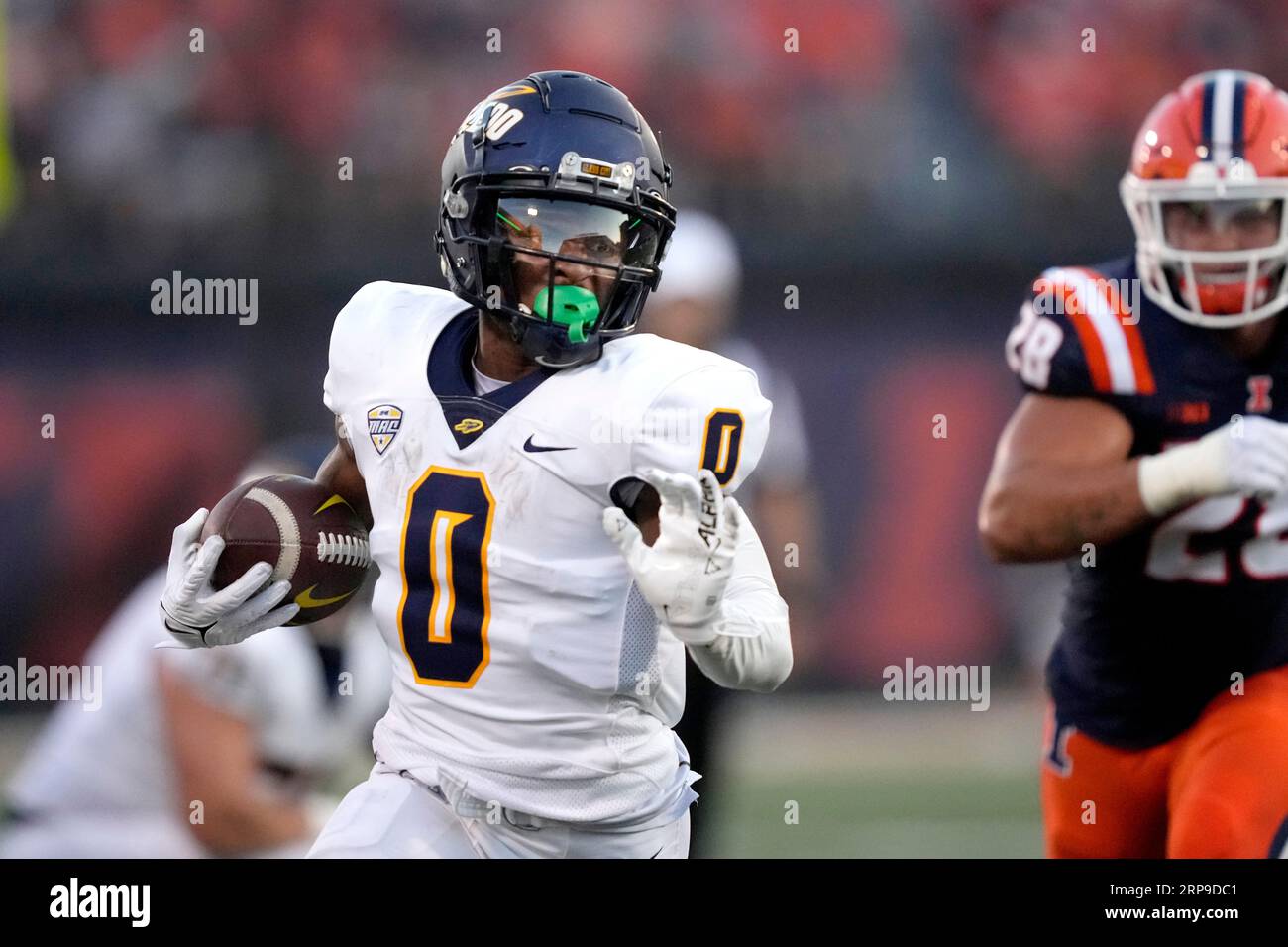 Toledo running back Jacquez Stuart carries the ball during an NCAA ...
