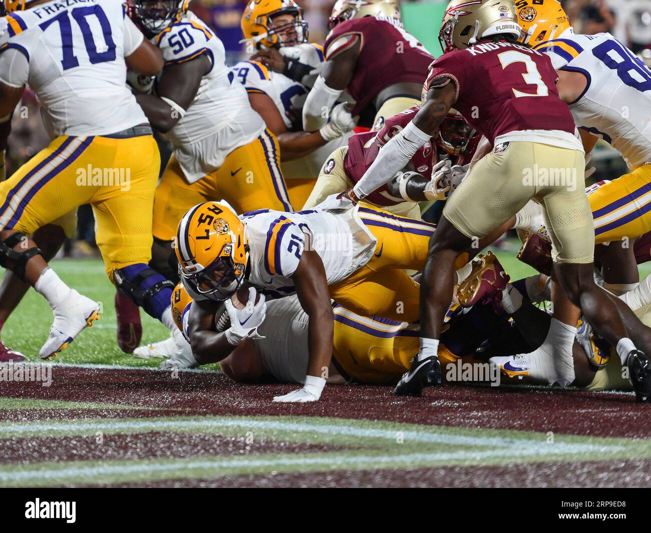 September 3, 2023: LSU Tigers running back Noah Cain (21) scores from ...