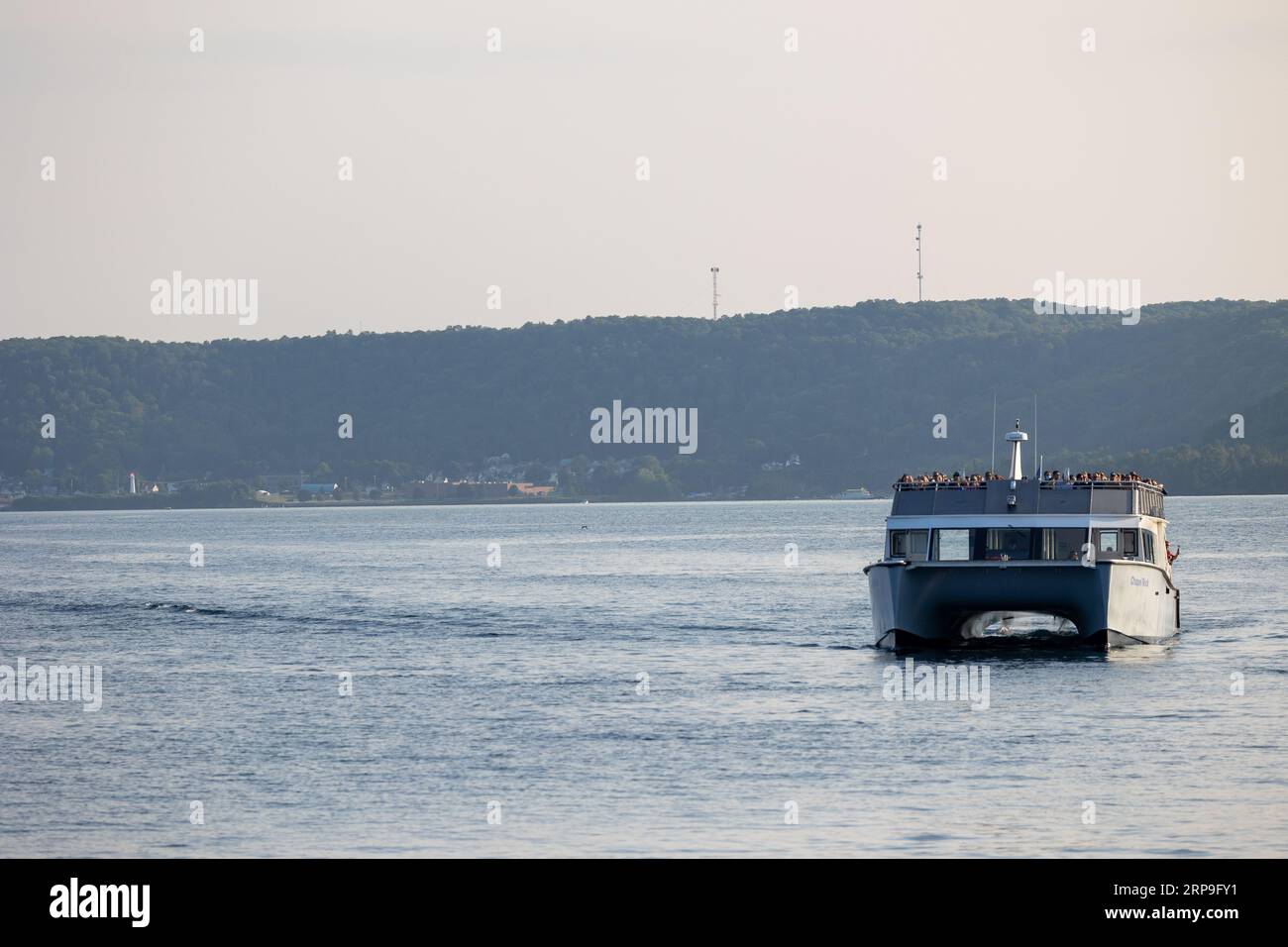 Catamaran full of tourists heading out to Pictured Rocks National ...