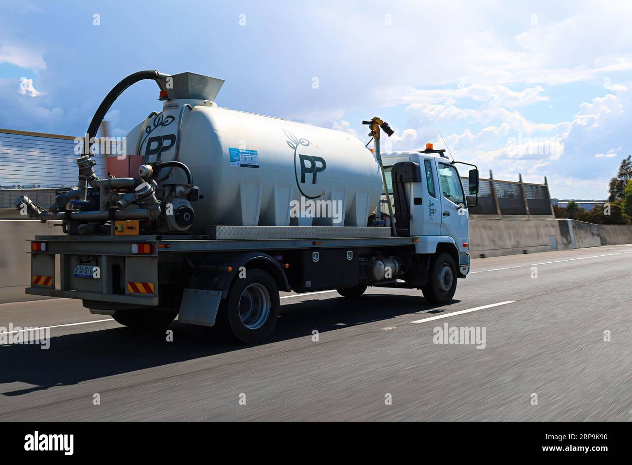 a truck rolling down a highway, tanker truck, water truck Stock Photo ...