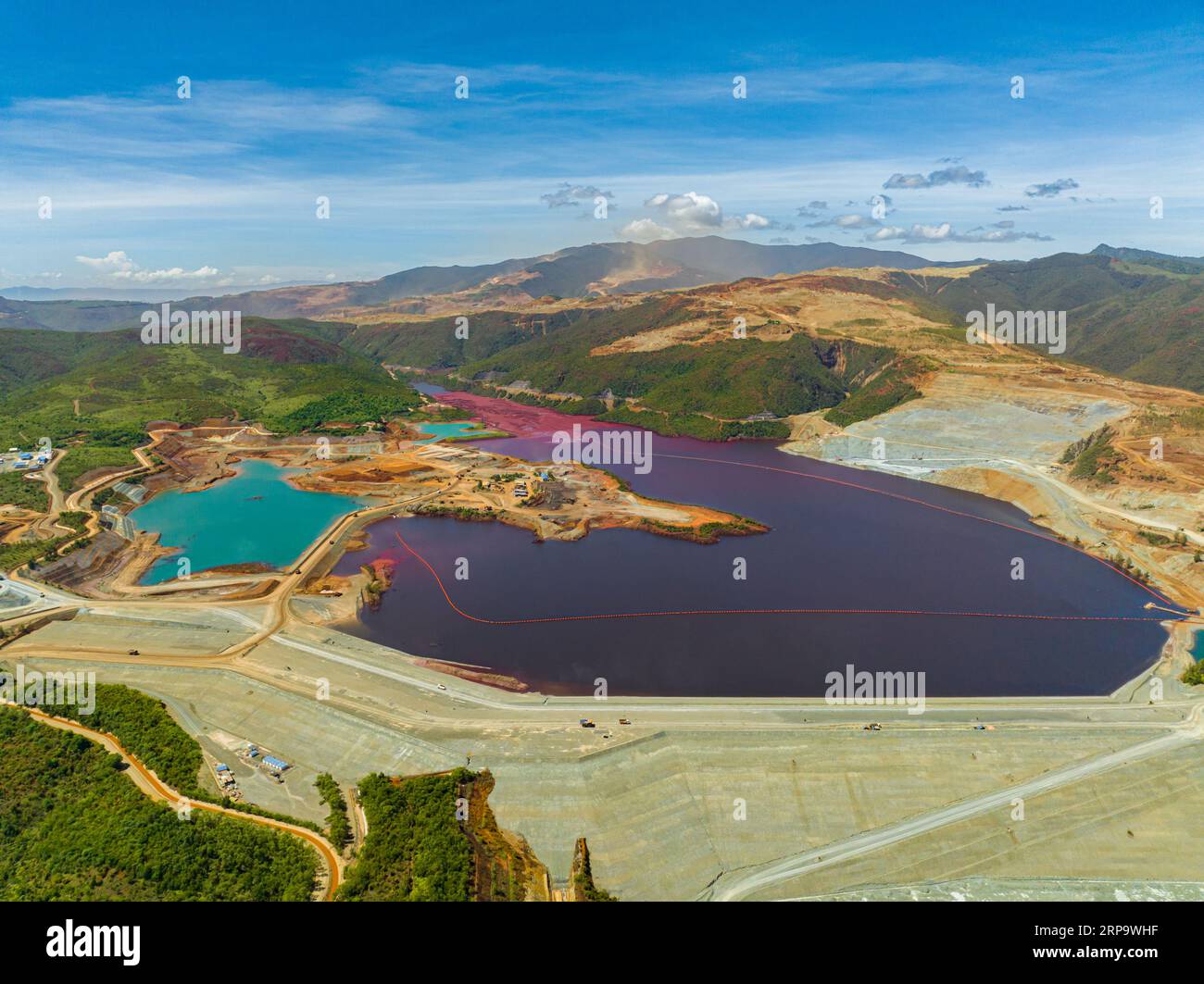 Nickel quarry and heavy equipment. Mining in an open pit. Mindanao ...