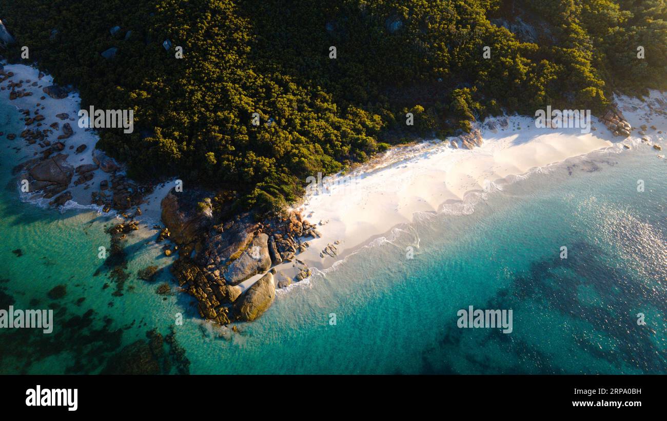 Aerial view of a tropical Albany Middleton Beach with white sand and ...