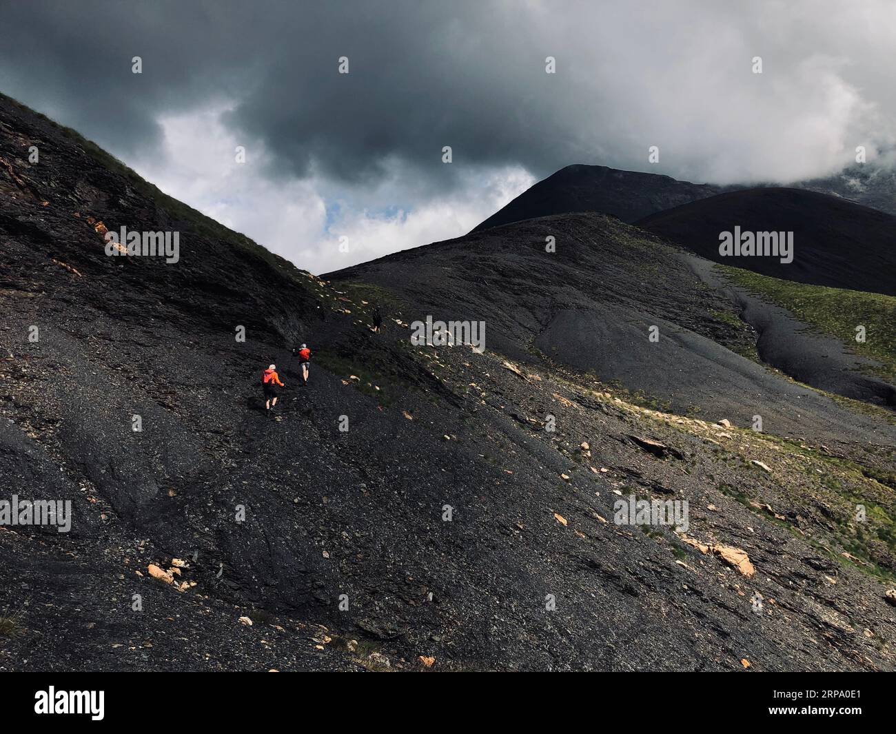 Group people hike up steep hi-res stock photography and images - Alamy