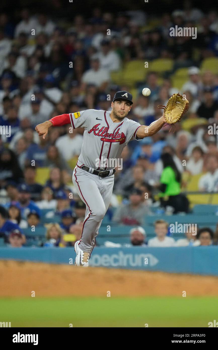 Atlanta Braves first baseman Matt Olson looks to catch a throw for the ...
