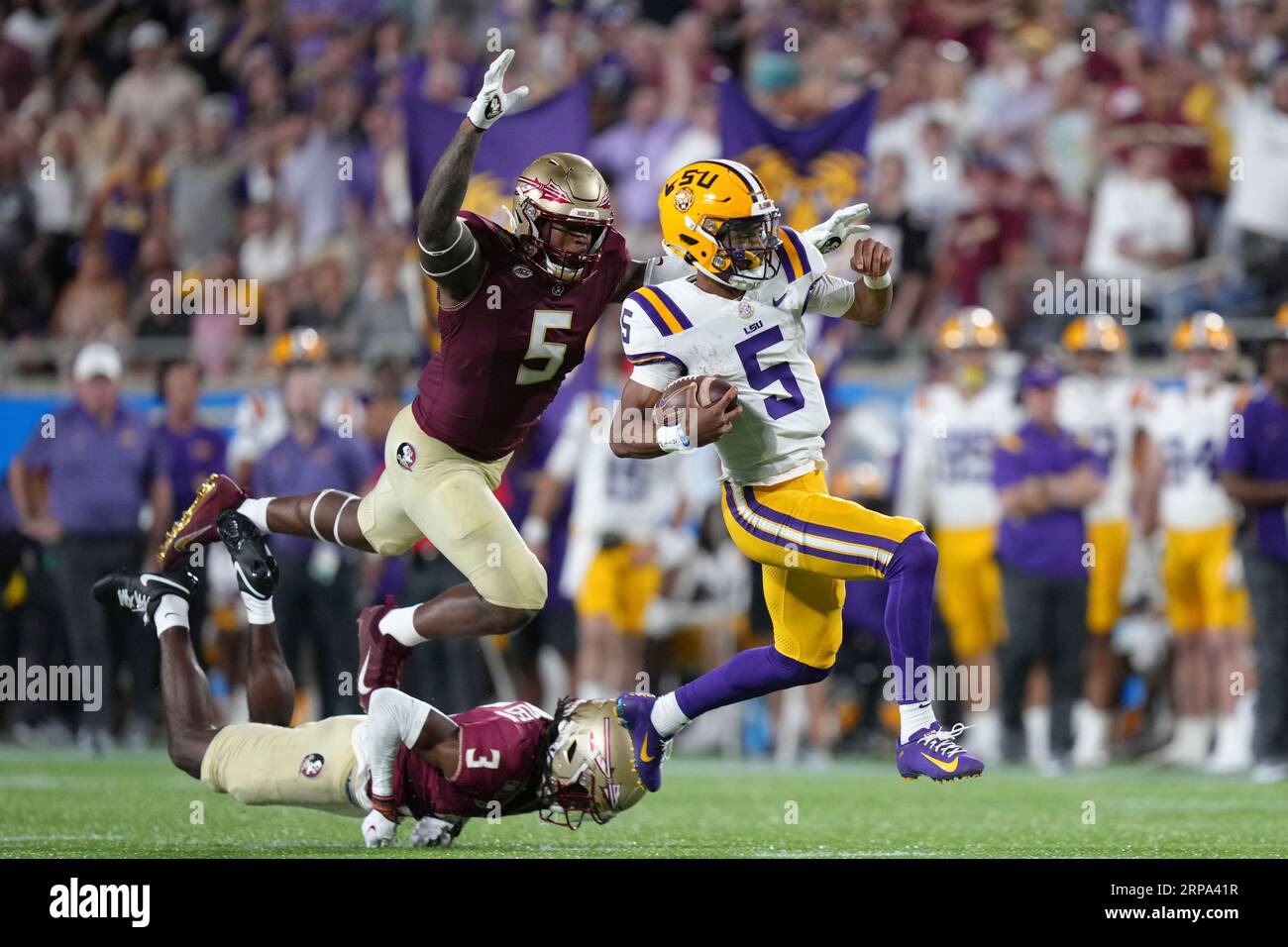 ORLANDO, FL - SEPTEMBER 03: LSU Tigers quarterback Jayden Daniels (5 ...