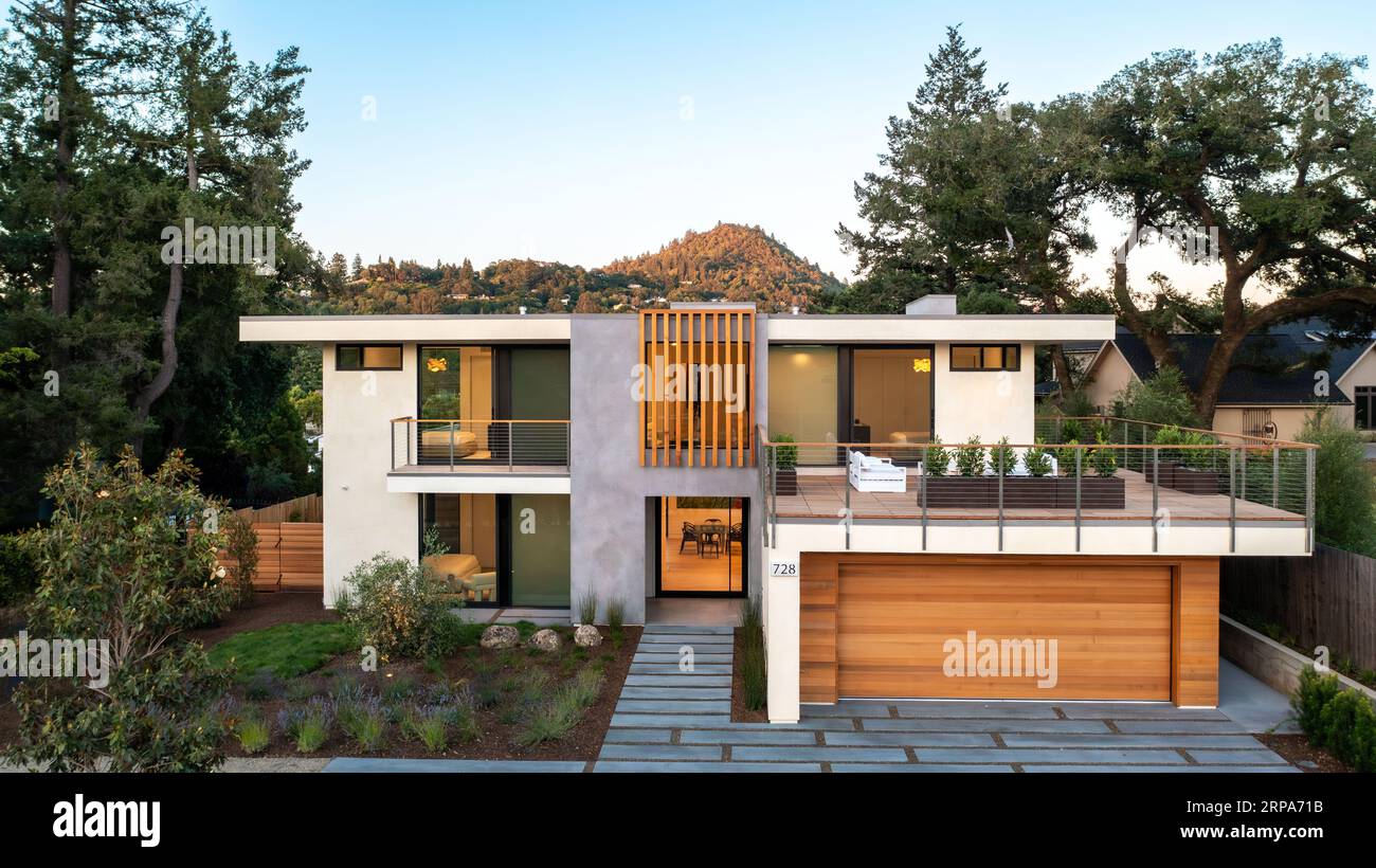 This modern two-story home features contrasting colors and unique ...