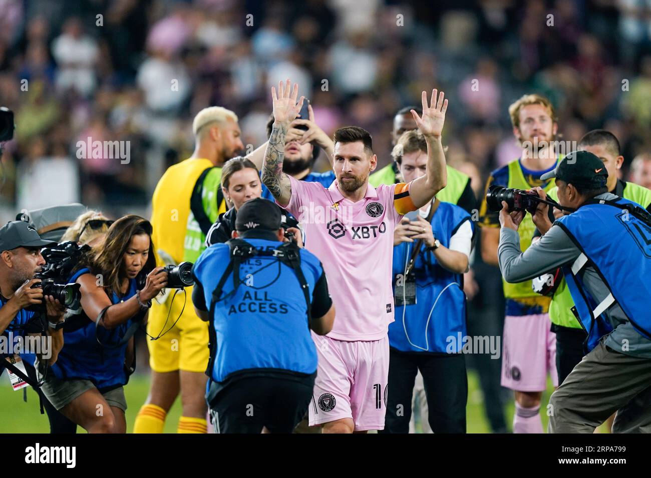 Inter Miami forward Lionel Messi waves to the crowd after winning an ...