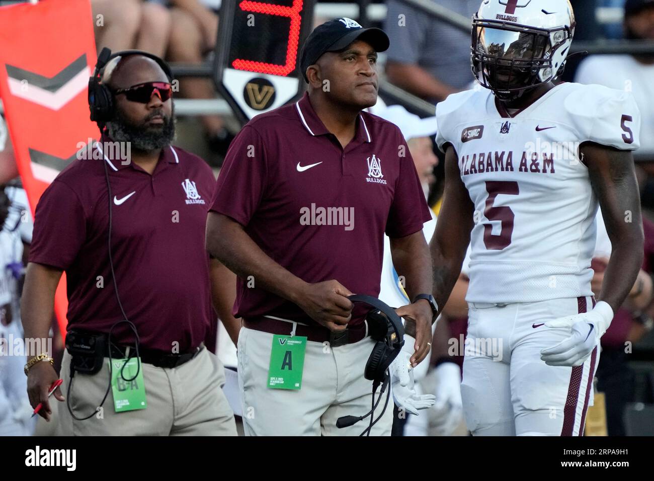 Alabama A&M head coach Connell Maynor, center, watches from the ...