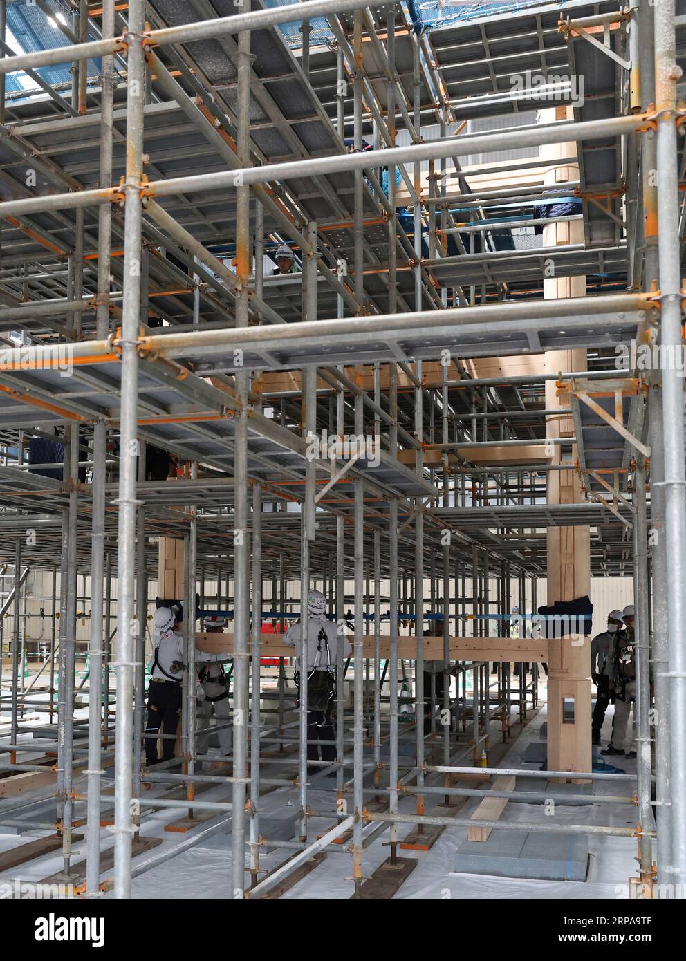 The construction work of pillars for the frame of Shuri Castle begins ...