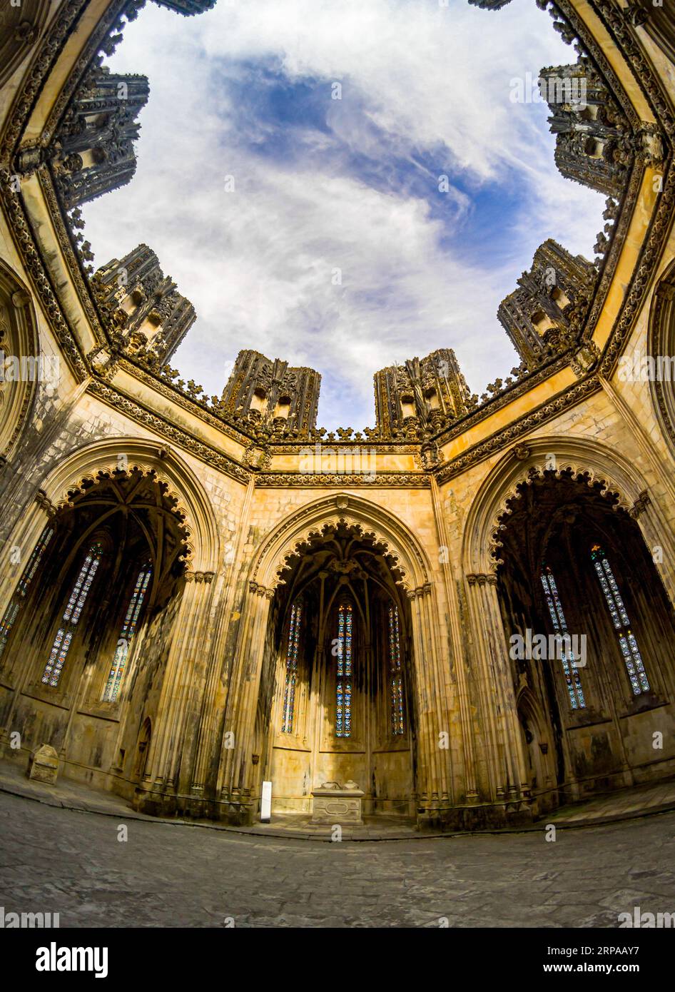 An ancient stone-built dome room within a structure stands with a ...