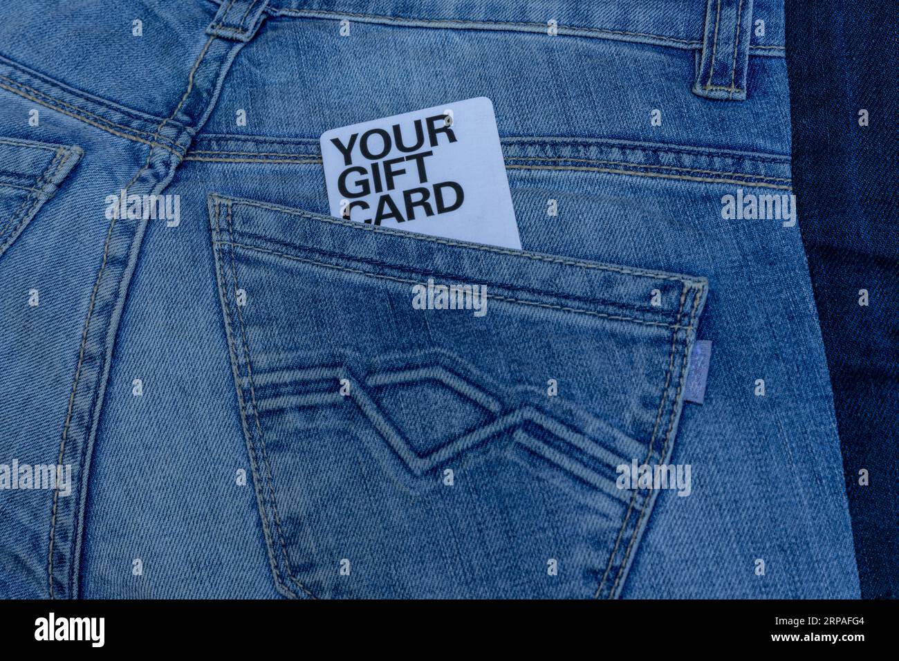 Valentine's Day greeting card in the trouser pocket Stock Photo - Alamy