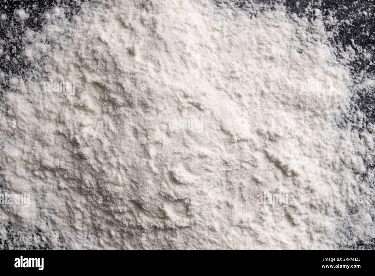 Wheat flour background, powder on black Stock Photo - Alamy