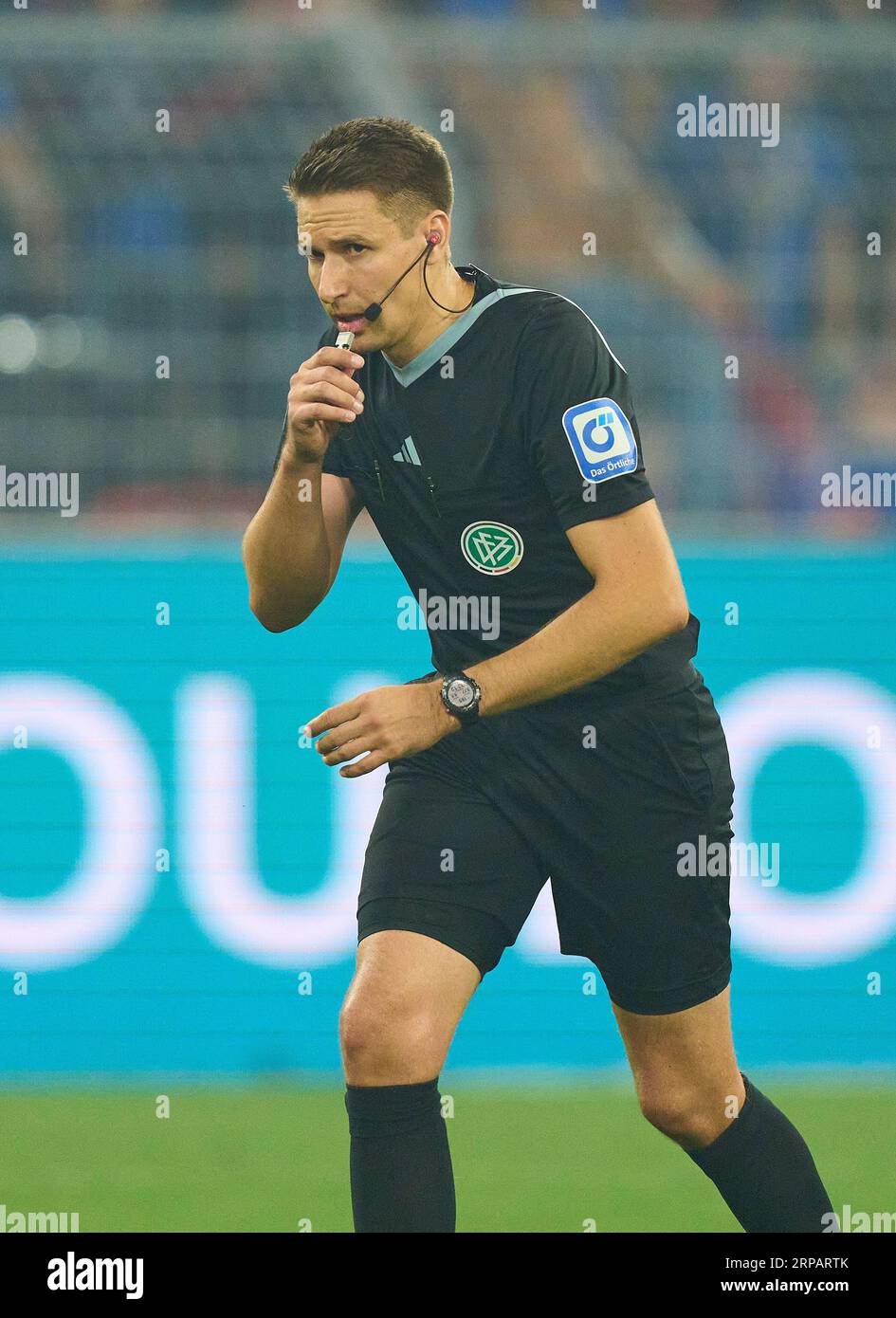 Referee tobias reichel with whistle hi-res stock photography and images ...
