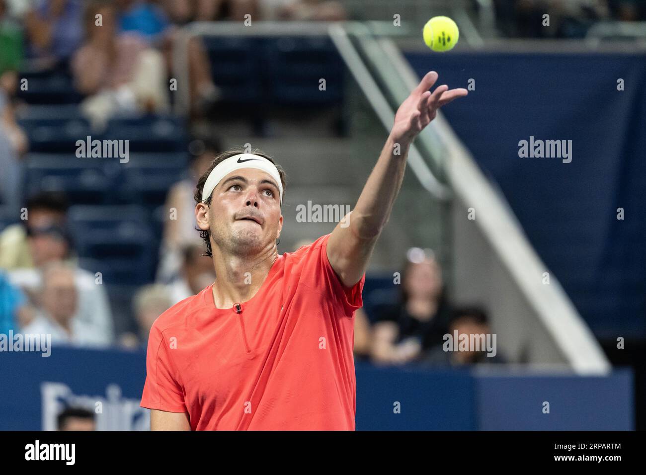 Taylor Fritz of USA serves during 4th round against Dominic Stricker of ...