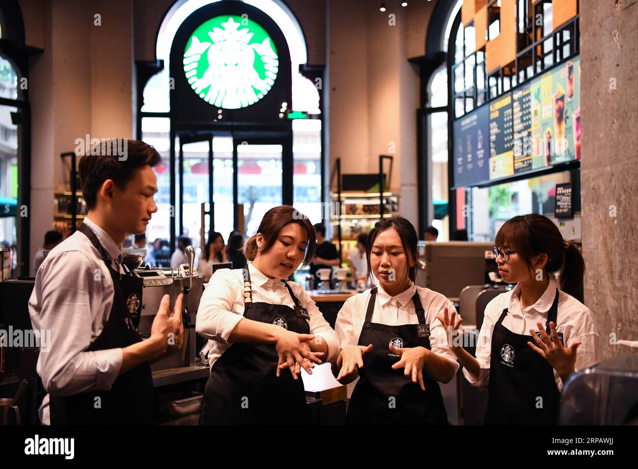 Starbucks sign language hi-res stock photography and images - Alamy