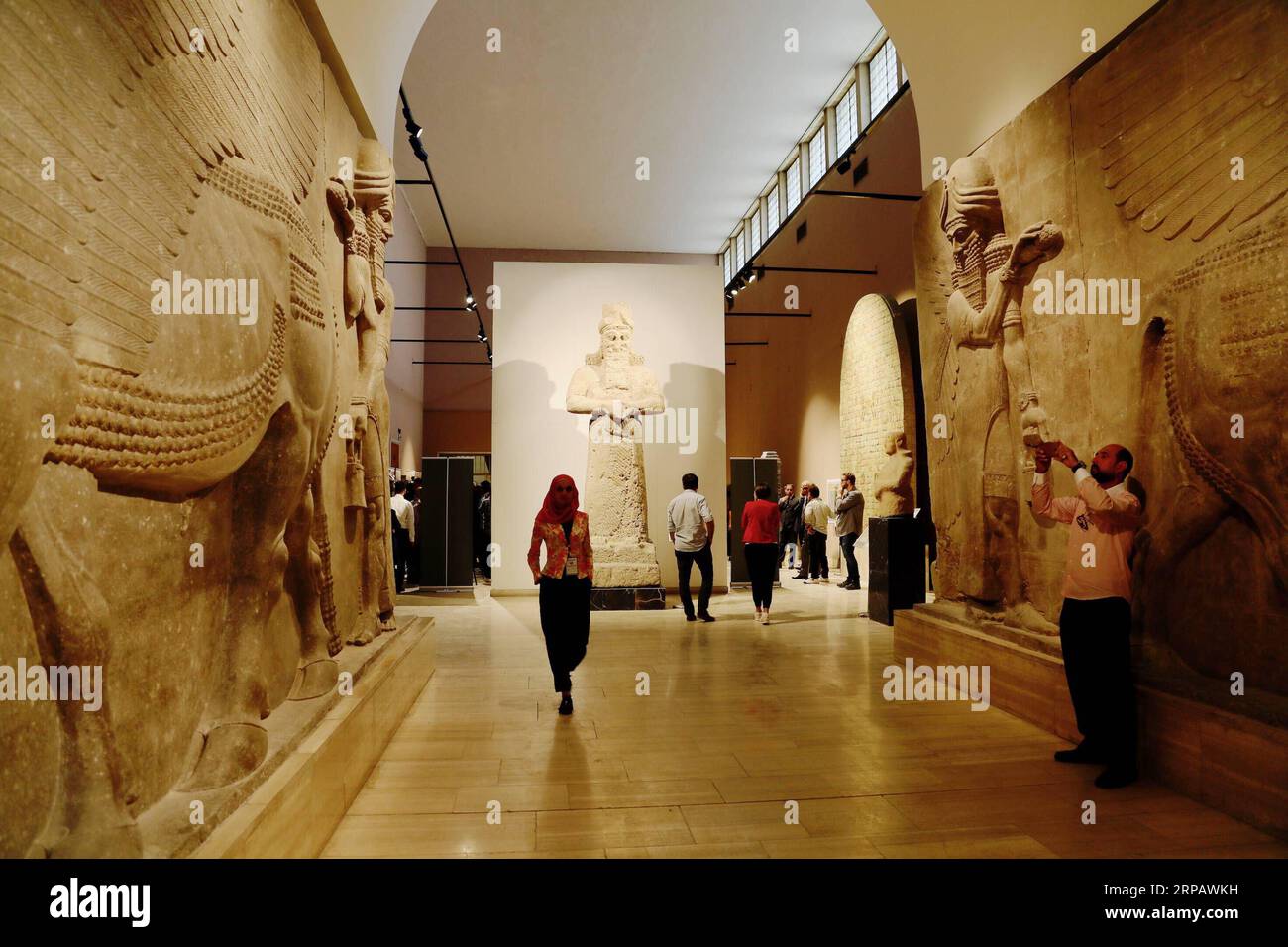 (190520) -- BAGHDAD, May 20, 2019 -- People tour a heritage exhibition ...