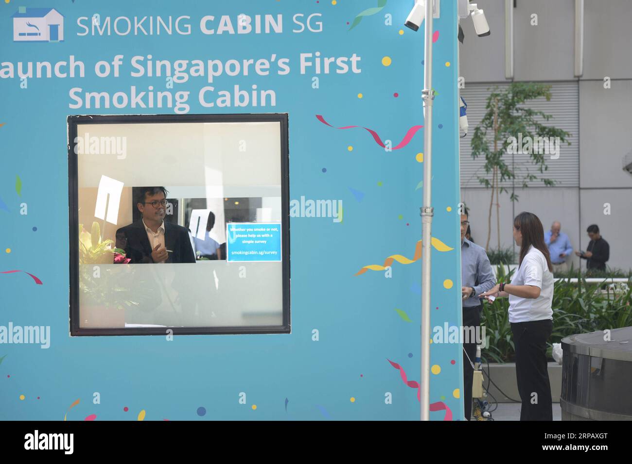 Singapore smoking cabin hi-res stock photography and images - Alamy