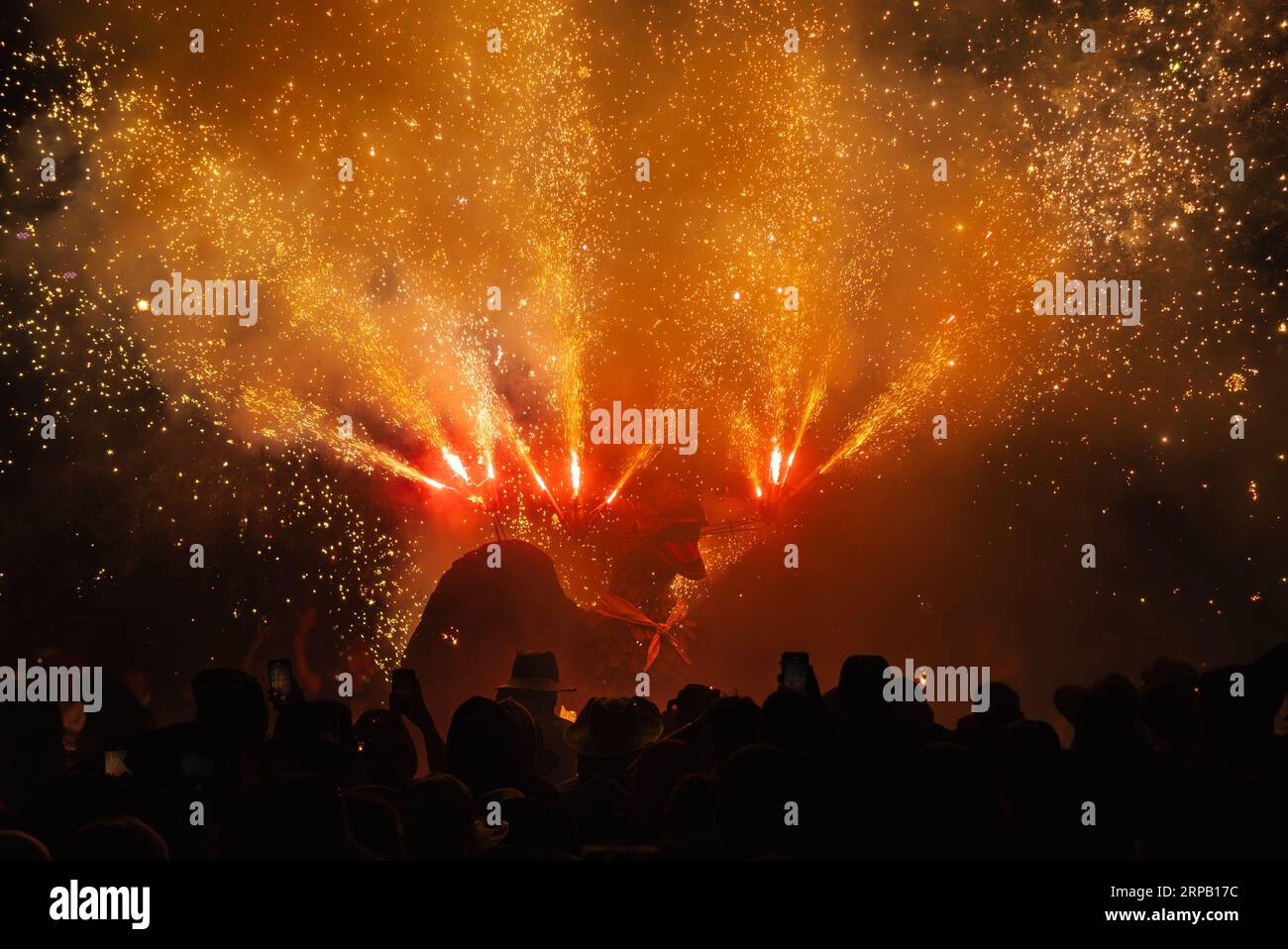 Dragon performing a pyrotechnic show from his head in Correfoc and ...