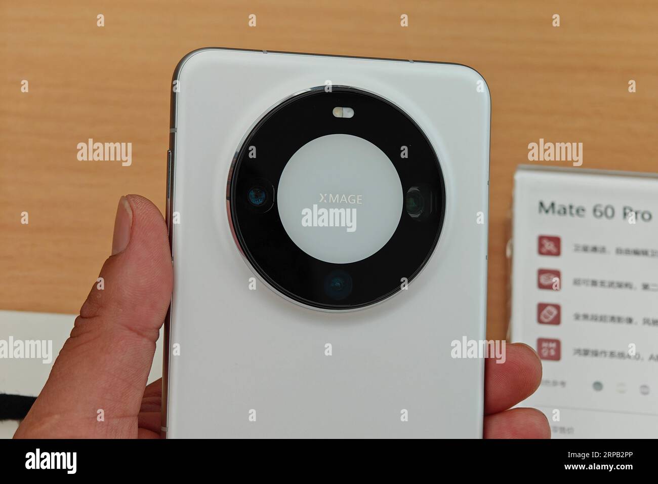 SHANGHAI, CHINA - SEPTEMBER 4, 2023 - Customers try Huawei's Mate60 Pro mobile phone at the ...