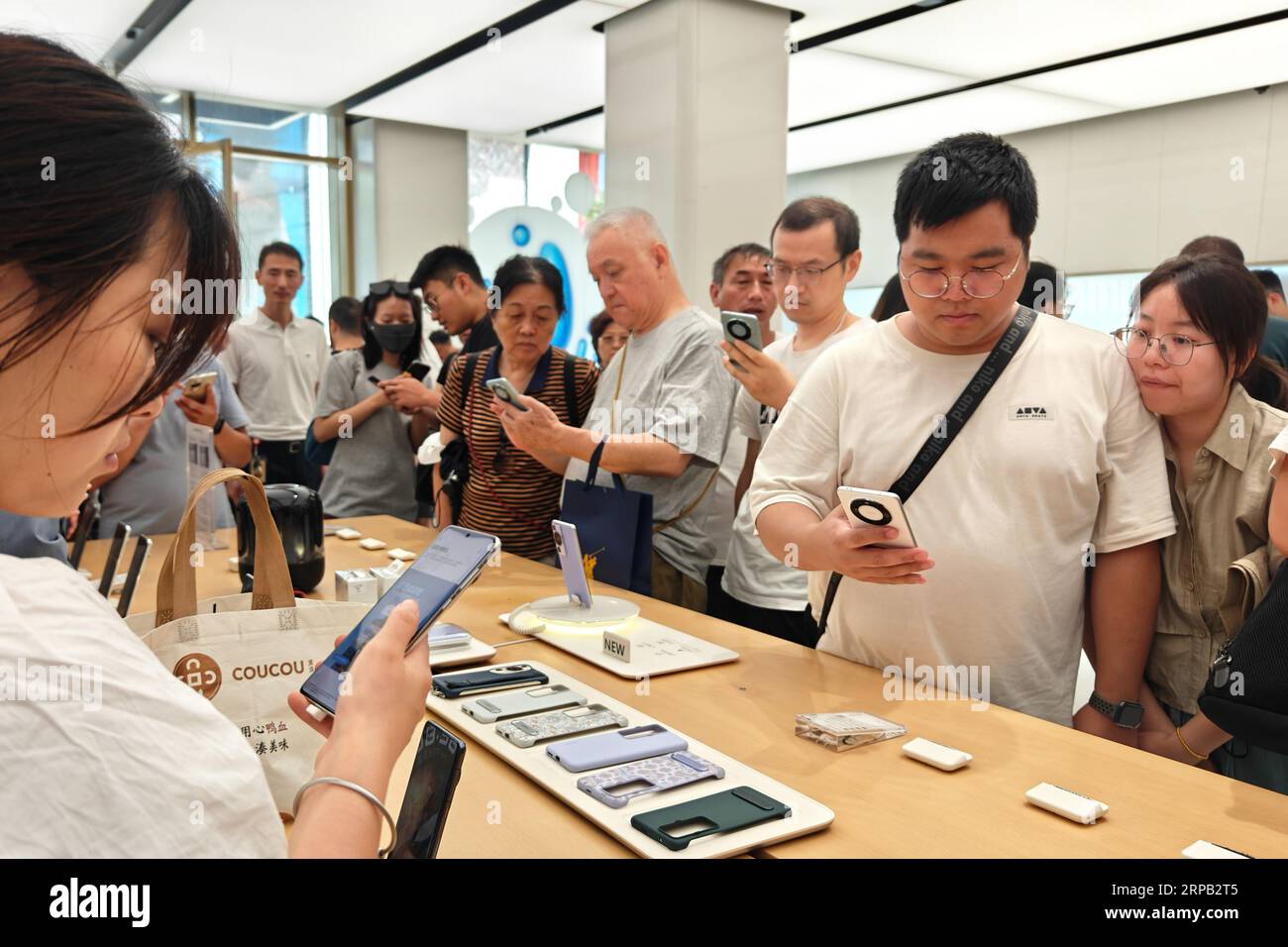 SHANGHAI, CHINA - SEPTEMBER 4, 2023 - Customers try Huawei's Mate60 Pro ...