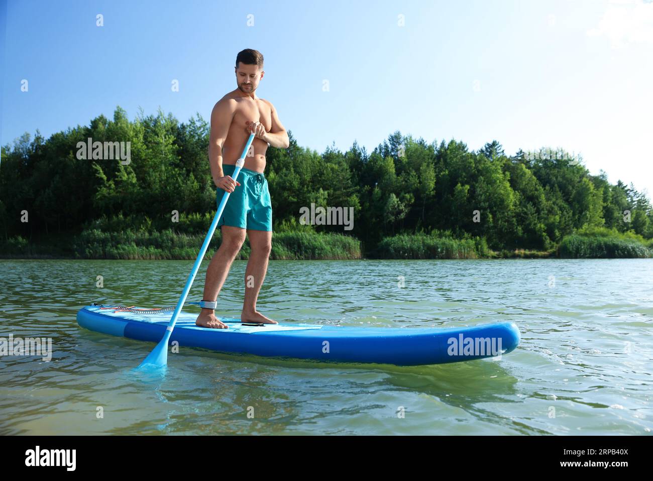 Man paddle hi-res stock photography and images - Alamy