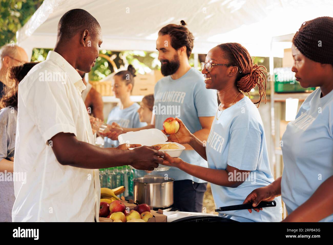 Homeless african american food hi-res stock photography and images - Alamy