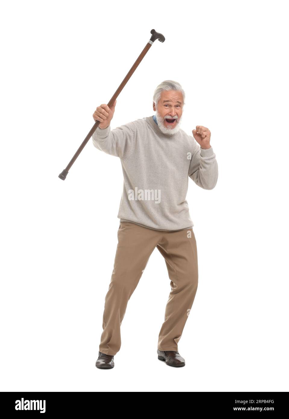 Emotional senior sports fan with walking cane isolated on white Stock ...