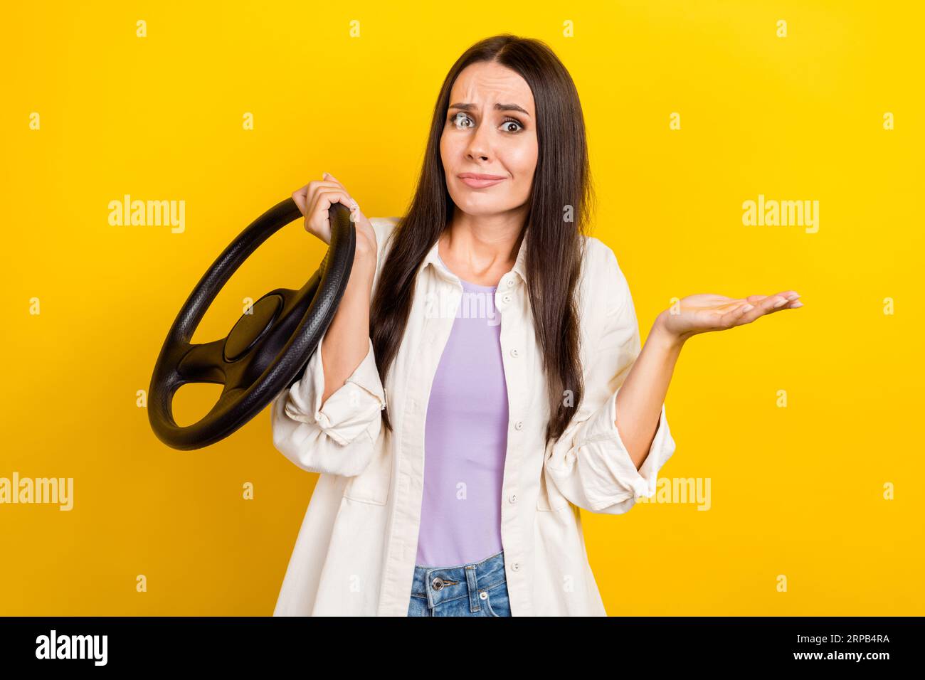 Portrait of indifferent girl with straight hair wear white shirt hold ...