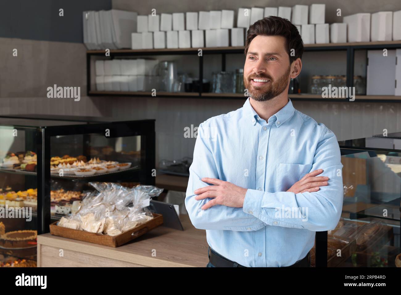 Portrait of happy business owner in bakery shop Stock Photo - Alamy