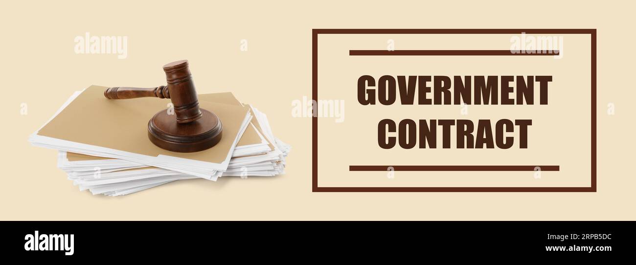 Words Government Contract, wooden gavel and file folders with documents ...