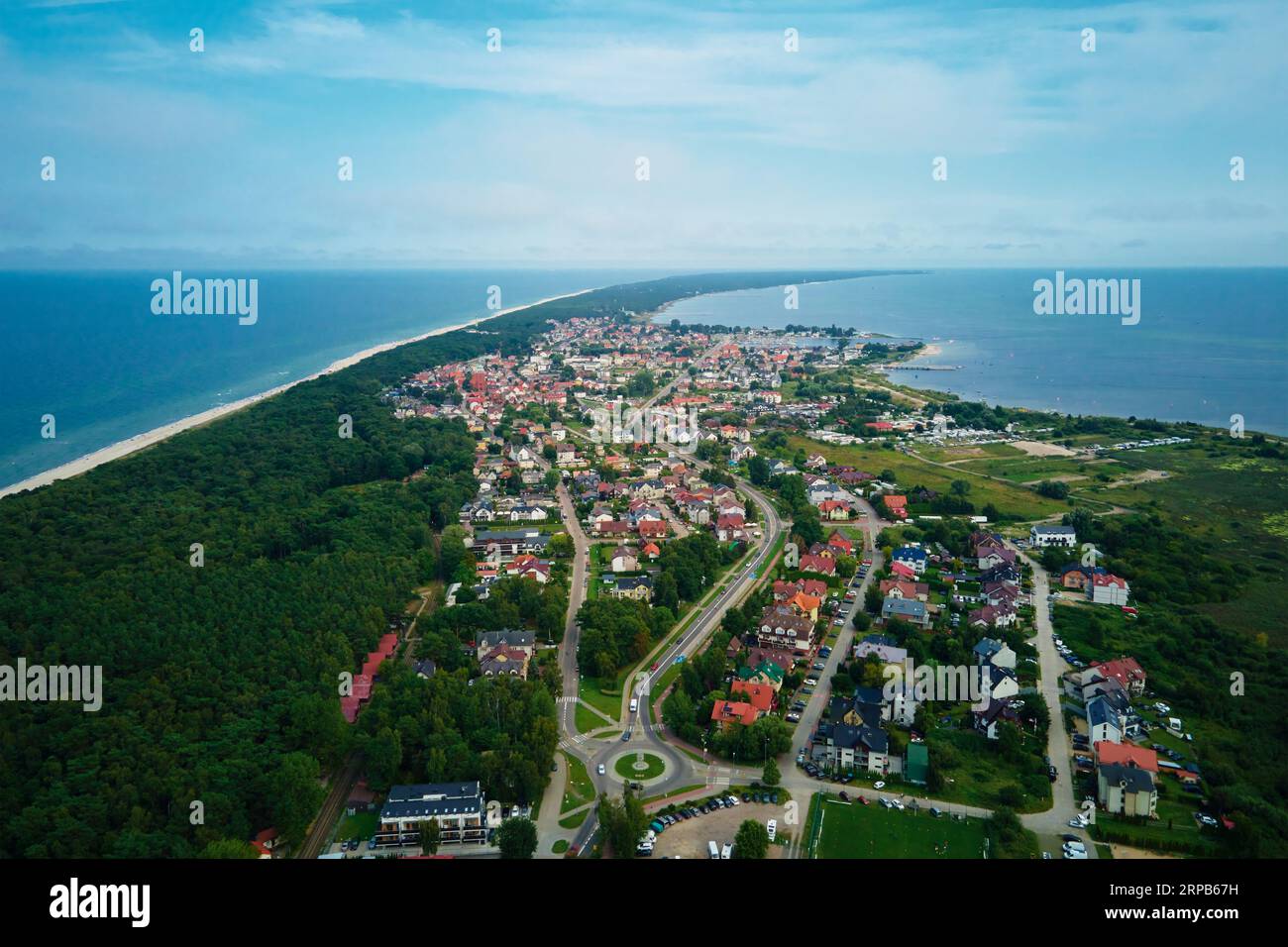 Birds eye view of sea landscape with sandy beach and Jastarnia city on ...