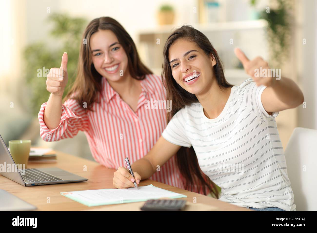 Thumbs up contract employment hi-res stock photography and images - Alamy