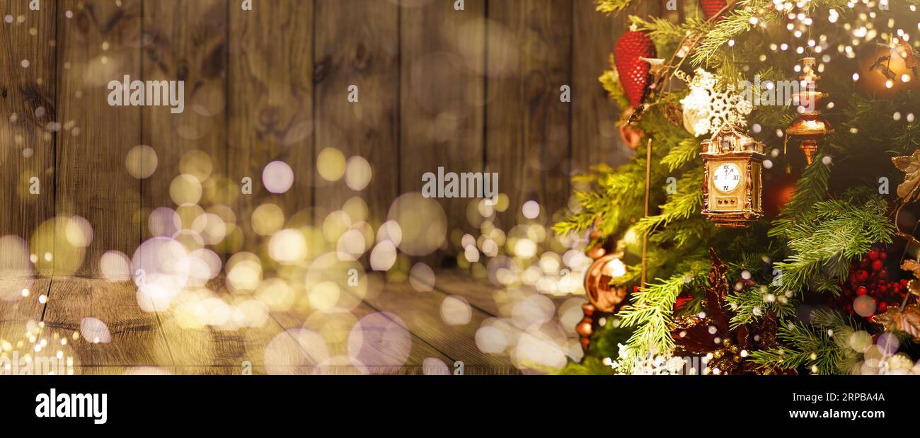 Empty table in front of christmas tree with decorations background. For ...