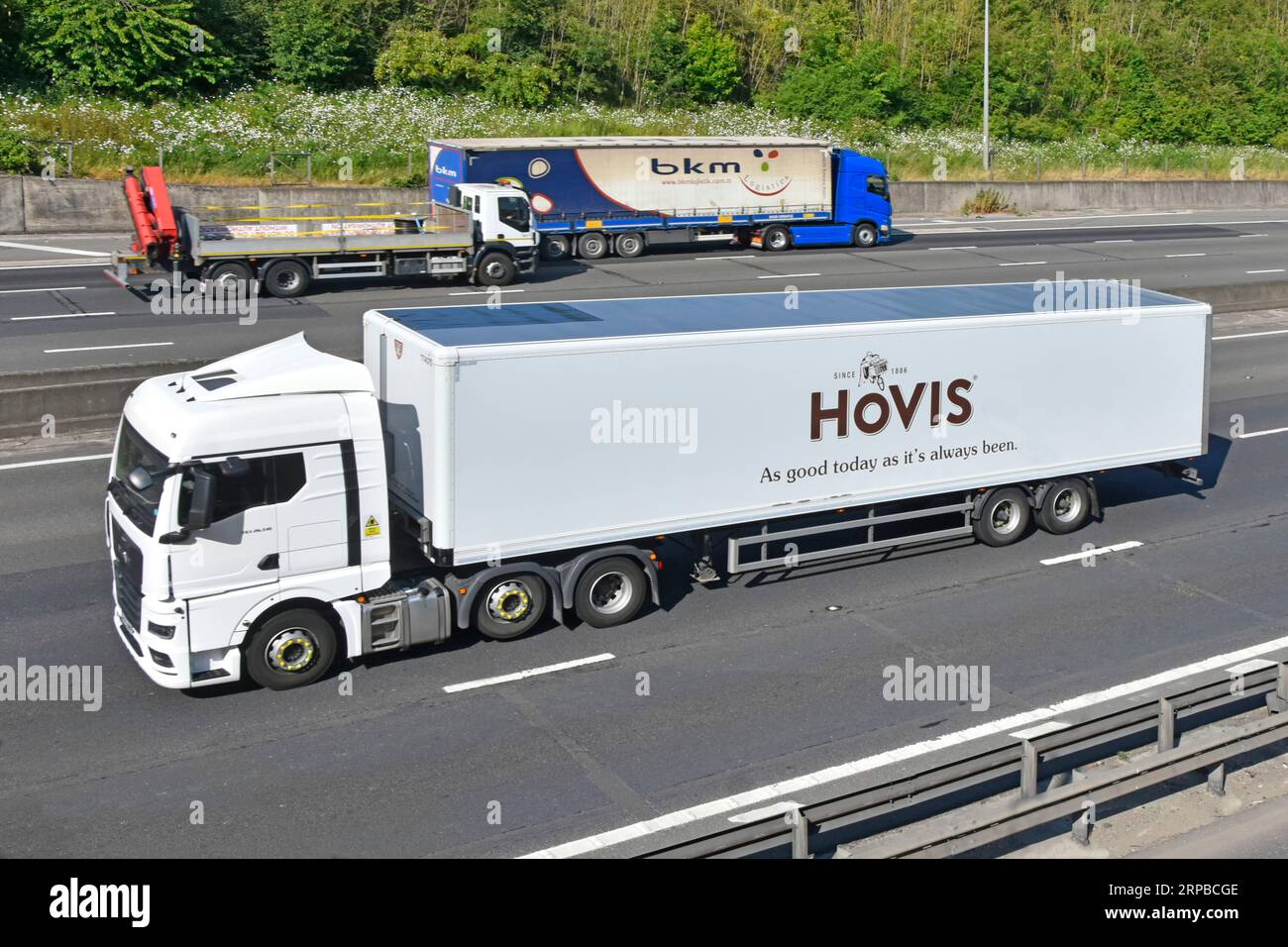 Aerial side front view hgv prime mover lorry truck & Hovis Ltd flour ...
