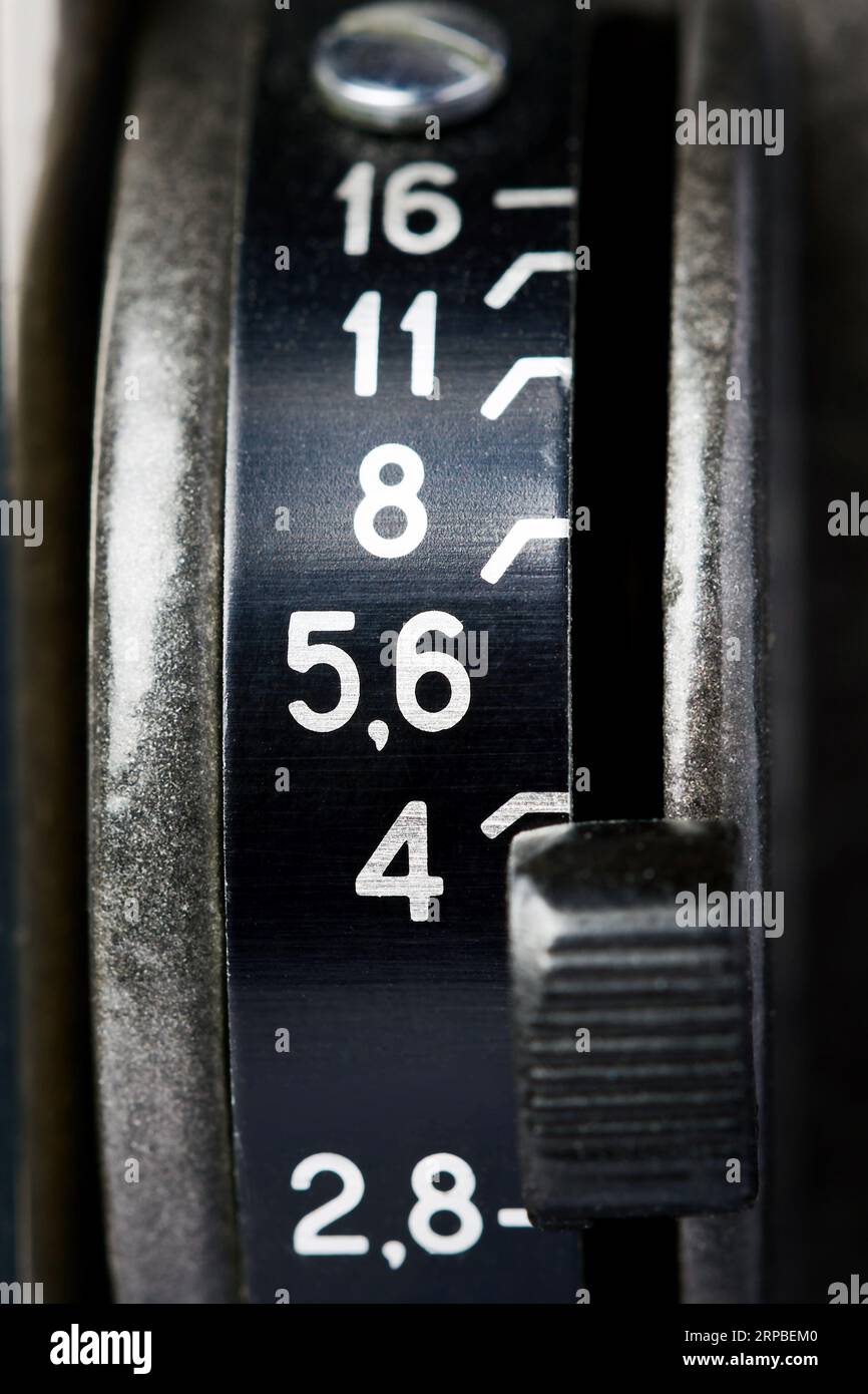 Aperture switch on an old retro movie camera Stock Photo - Alamy