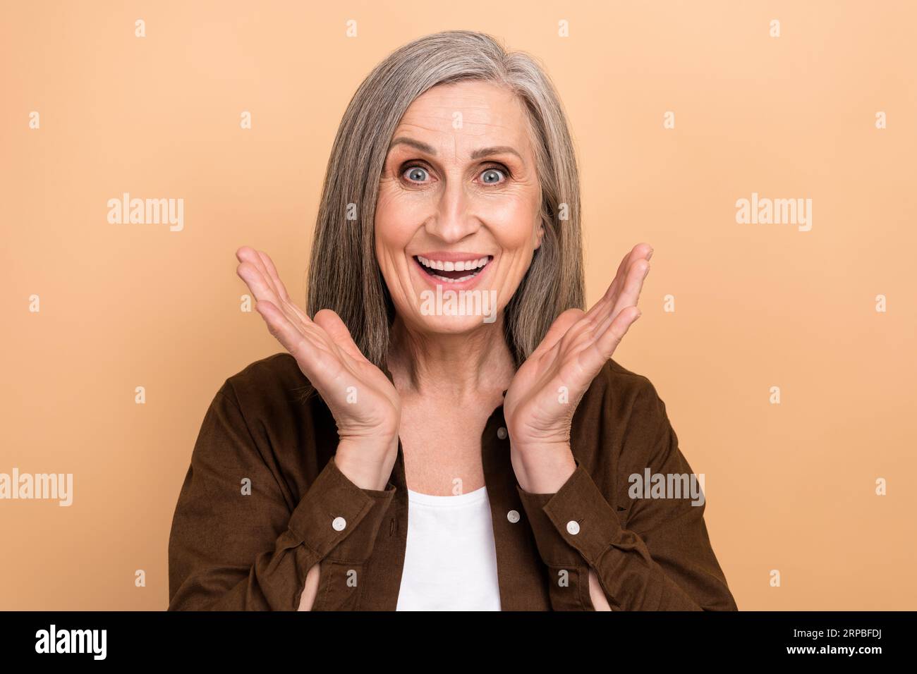 Photo of pensioner woman thankful impressed reaction surprise visit her ...