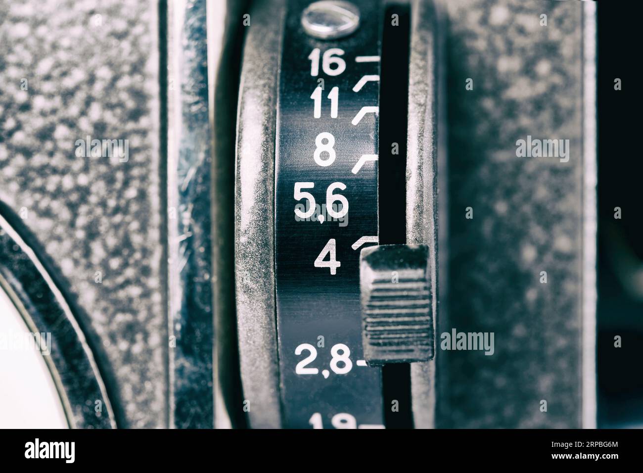 Aperture switch on an old retro movie camera Stock Photo - Alamy