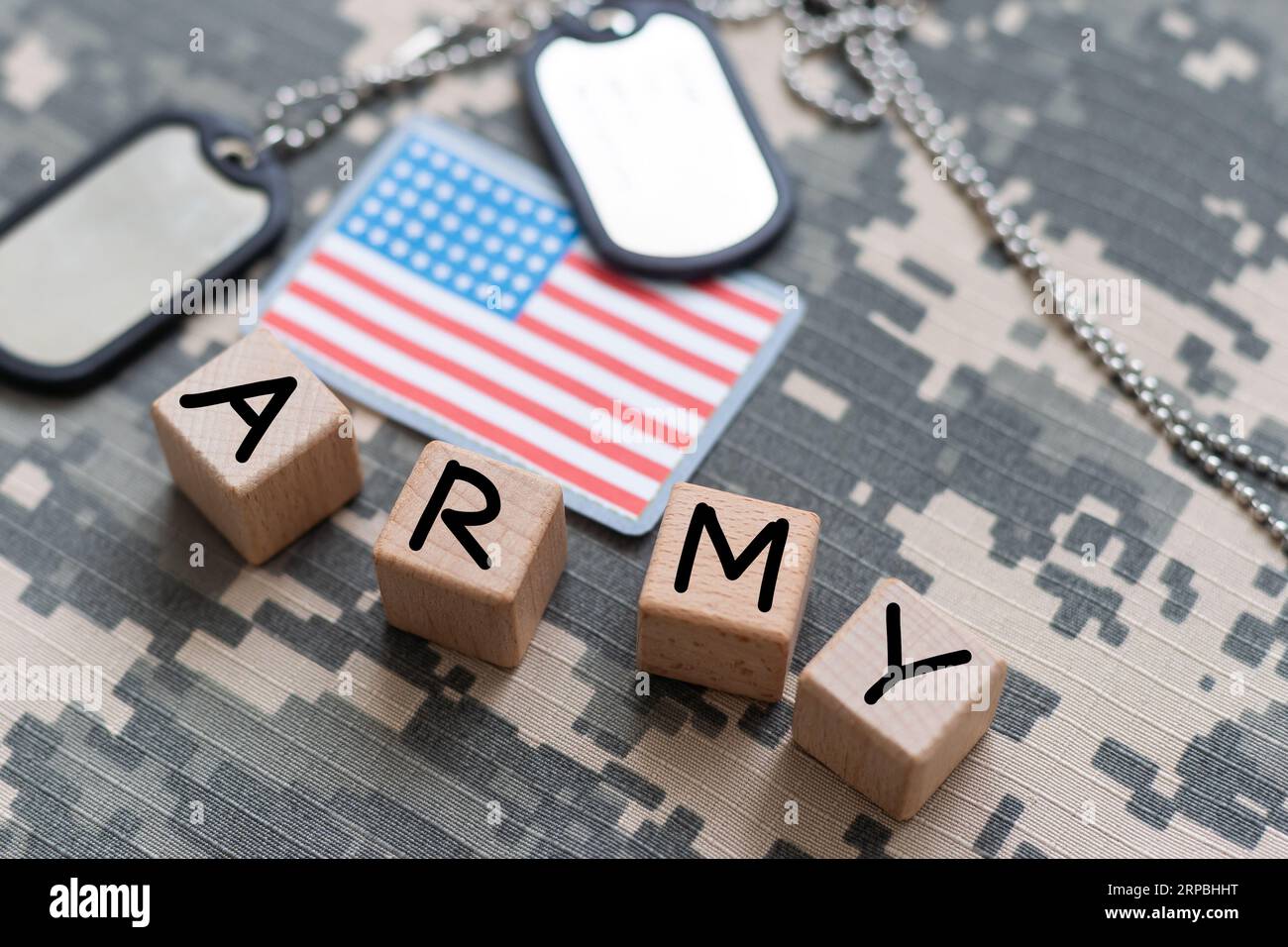 Military ID tags and US army patches on camouflage background, flat lay ...