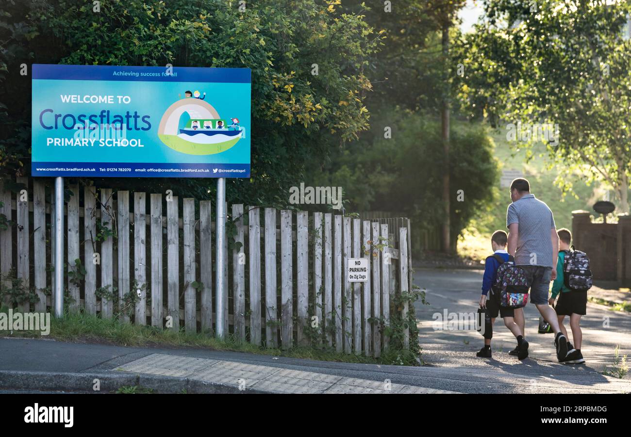 Children arrive at Crossflatts primary in Bradford which has been ...